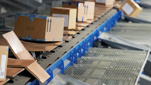 Tilt Tray Sorter | Sortation Conveyor Systems | Material Handling | Bastian Solutions